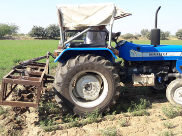 Tractor mounted rotary weeder - National Innovation Foundation-India